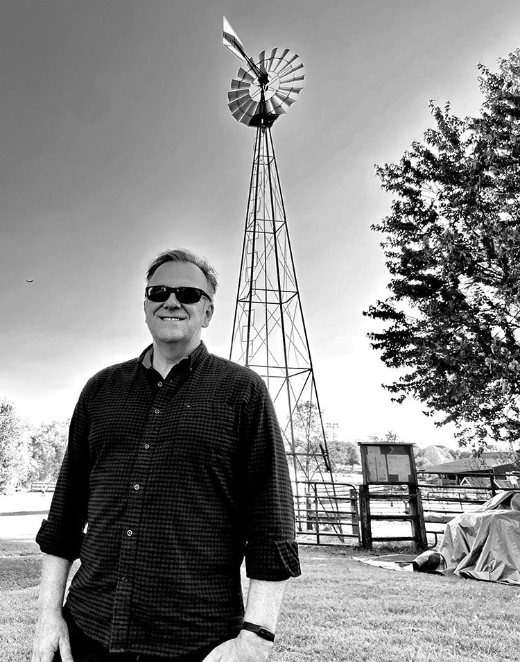 Joe Barsin in front of Kinder Farm Park's windmill. Featured in the ...